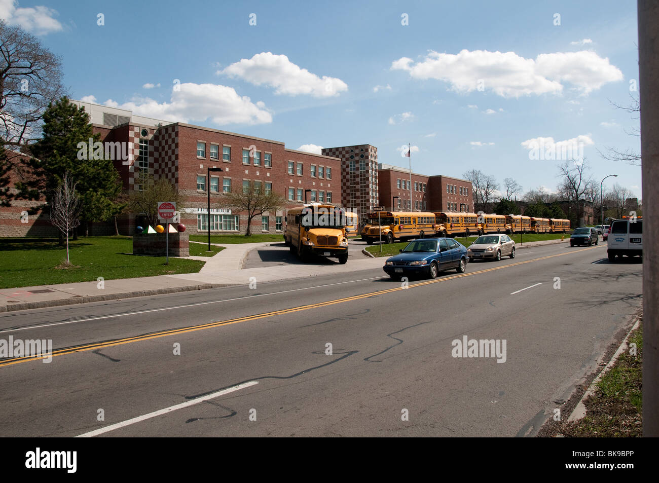 School buses leaving school hi-res stock photography and images - Alamy