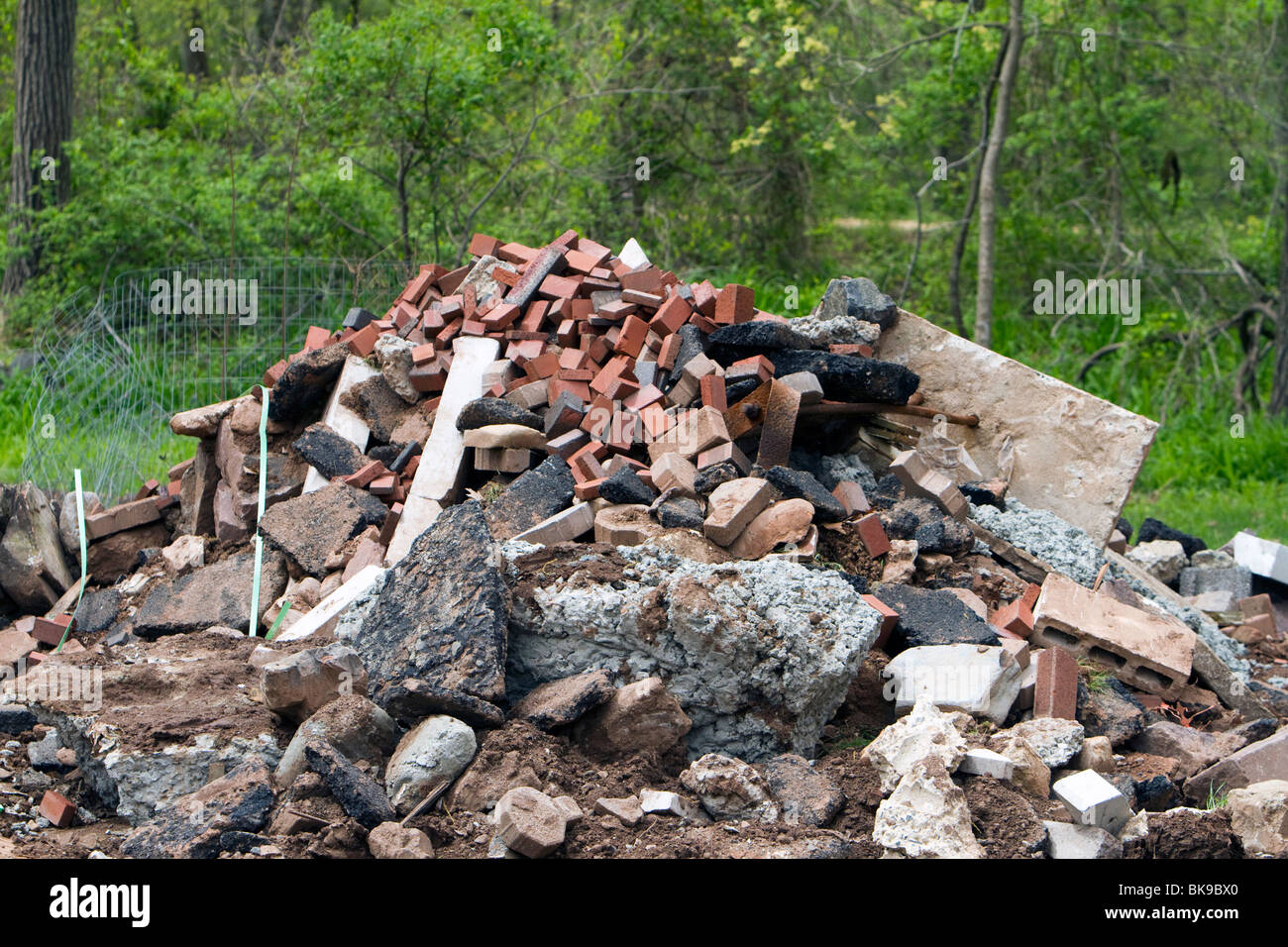Construction site debris pile of waste, used bricks, concrete slabs, rocks and dirt Stock Photo ...