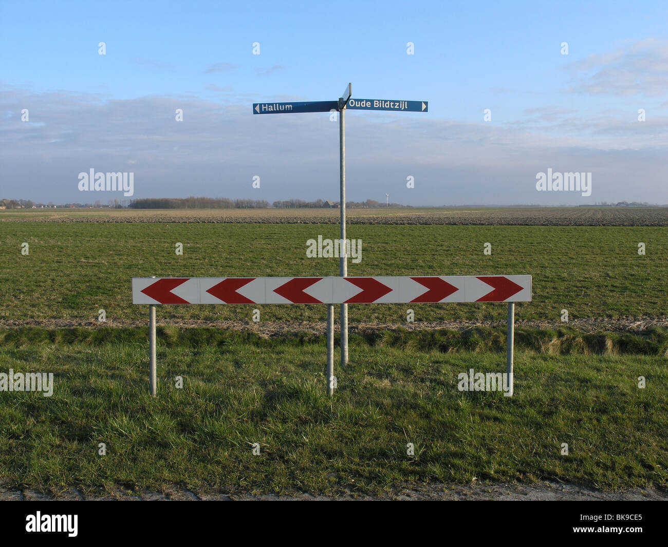 Street signs in a lonely landscape Stock Photo - Alamy