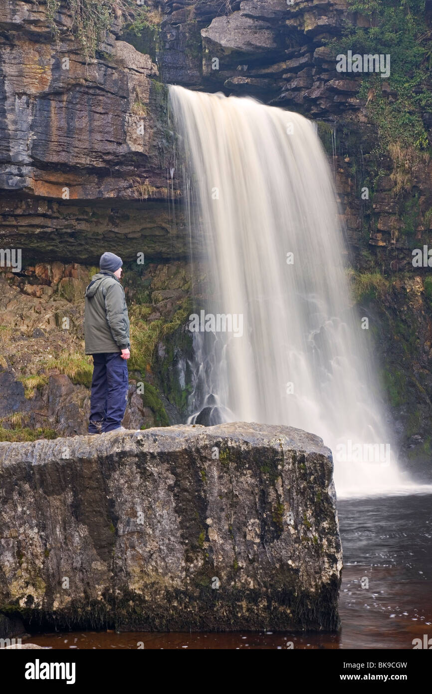 A Walker admiring the view of Thornton Force Waterfall, on The Ingleton ...