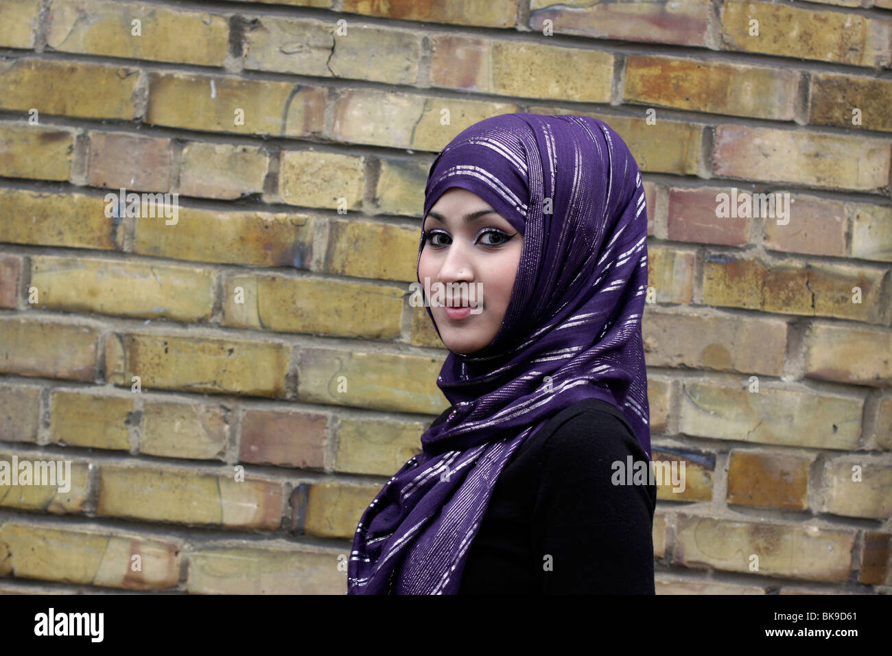 Young Muslim girl in London wearing a bright headscarf Stock Photo - Alamy