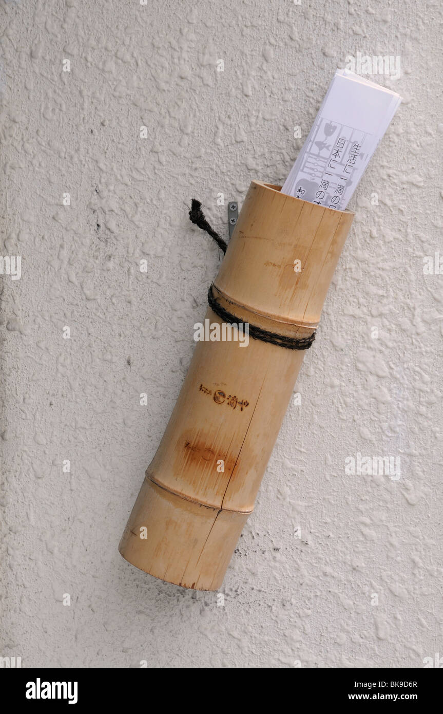 Letter box made of bamboo on an entrance door in Kyoto, Japan, Asia ...