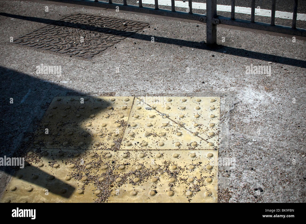 Drain cover and railings,commuters, commuting, emissions, england ...