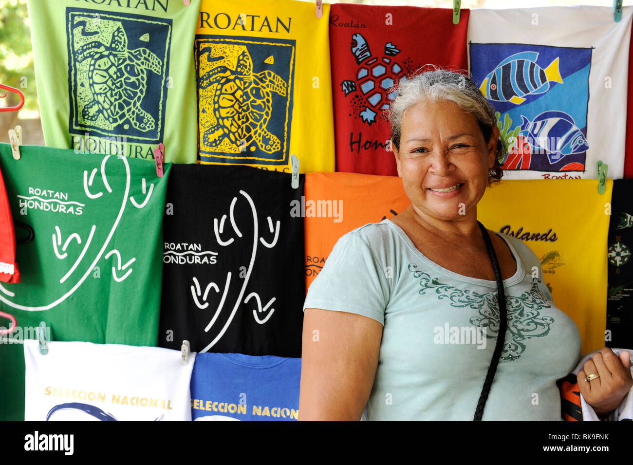 native Honduran with T-Shirts for sale near Caribbean Cruise ship in ...