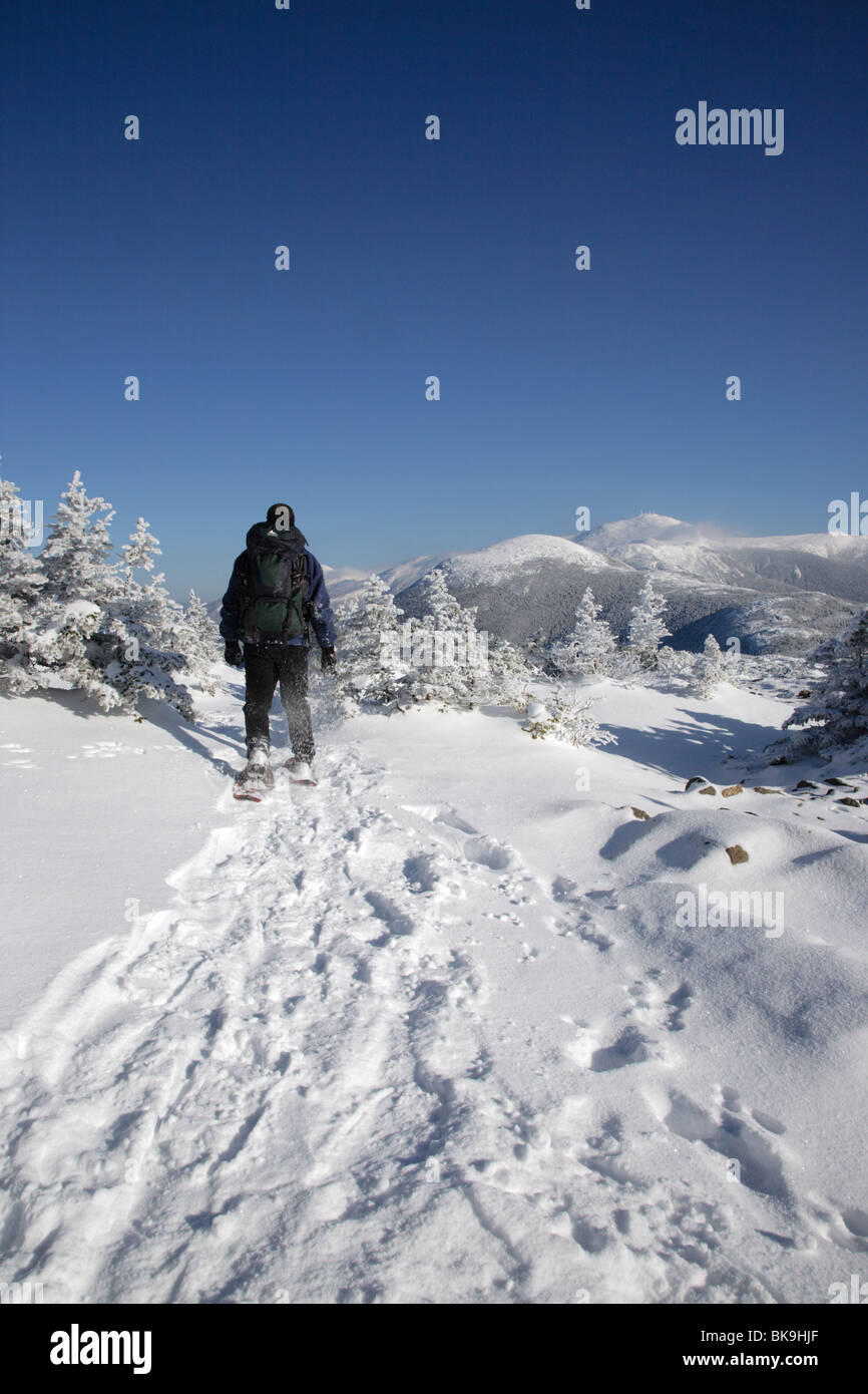 A hiker on the summit of Mount Pierce in the White Mountains, New ...