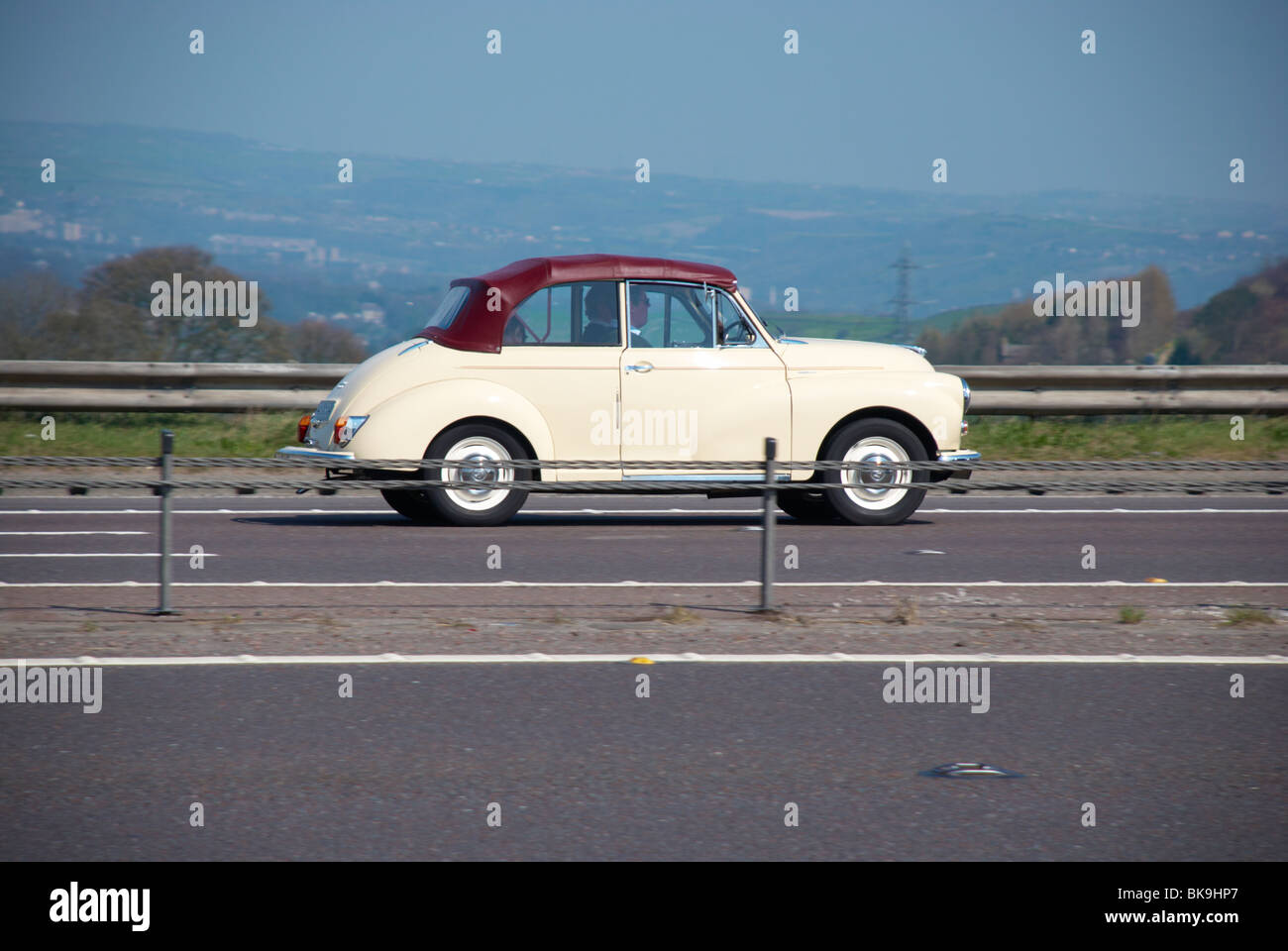 Classic car on the M62. Old morris minor Stock Photo - Alamy