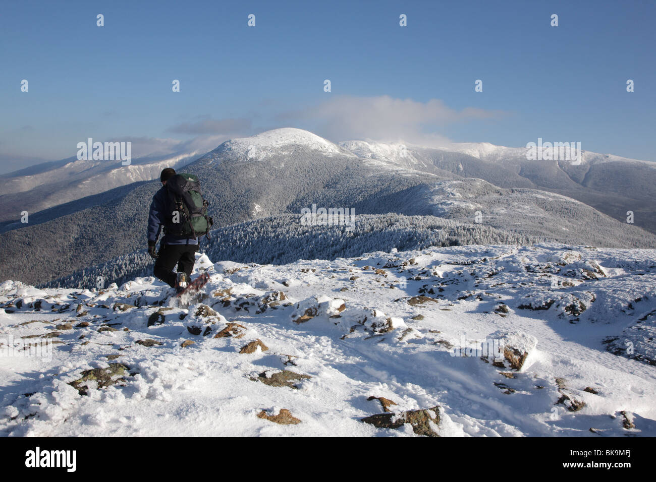 A hiker on the summit of Mount Pierce in the White Mountains, New ...