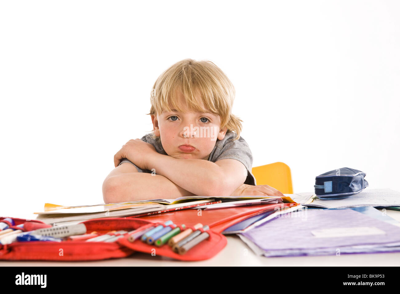 Boy doesn't feel like doing his homework Stock Photo - Alamy