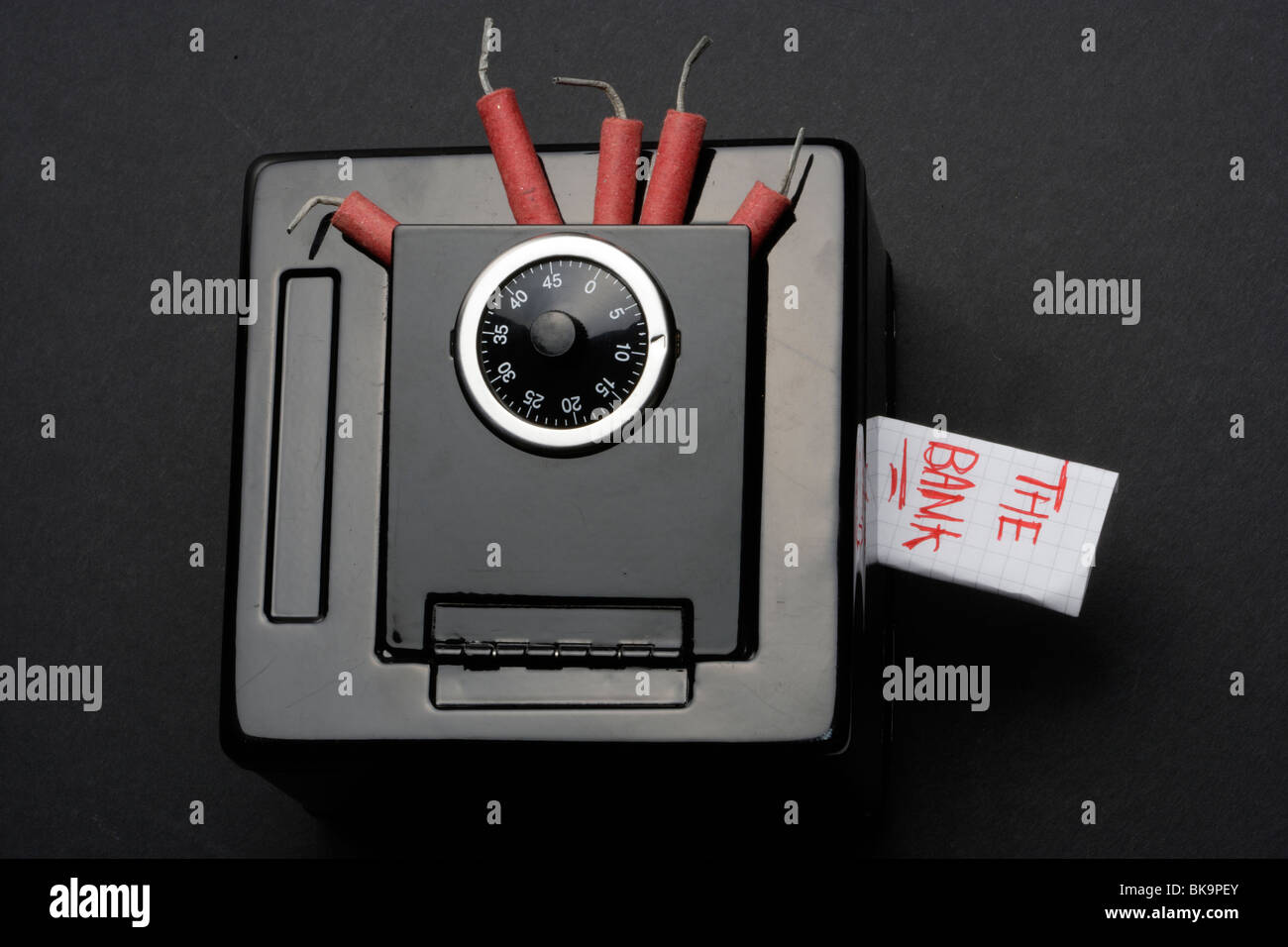 Toy safe (The Bank) with bangers (Dynamite Stock Photo - Alamy