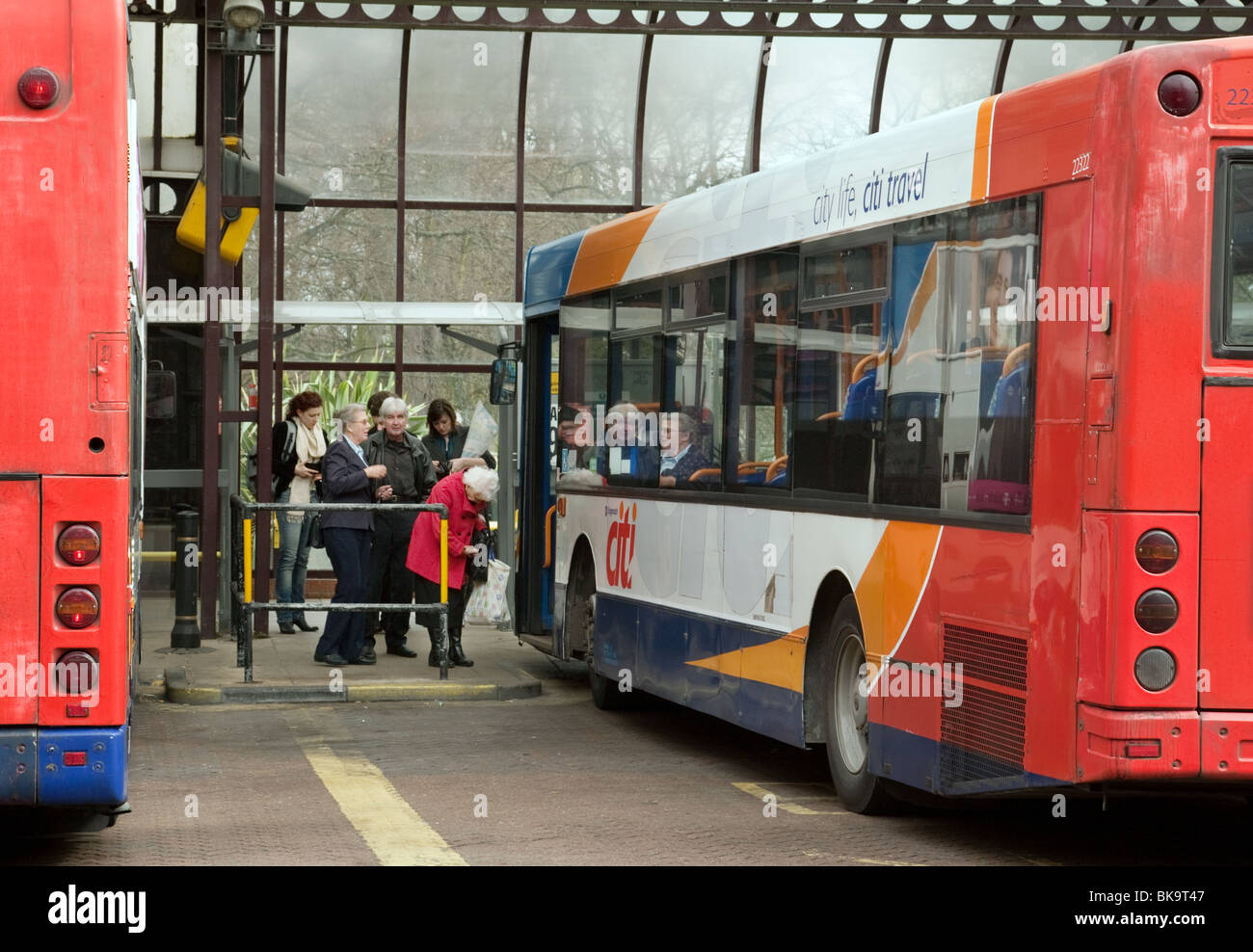 People getting on a bus at Cambridge bus station, Drummer St, Cambridge ...