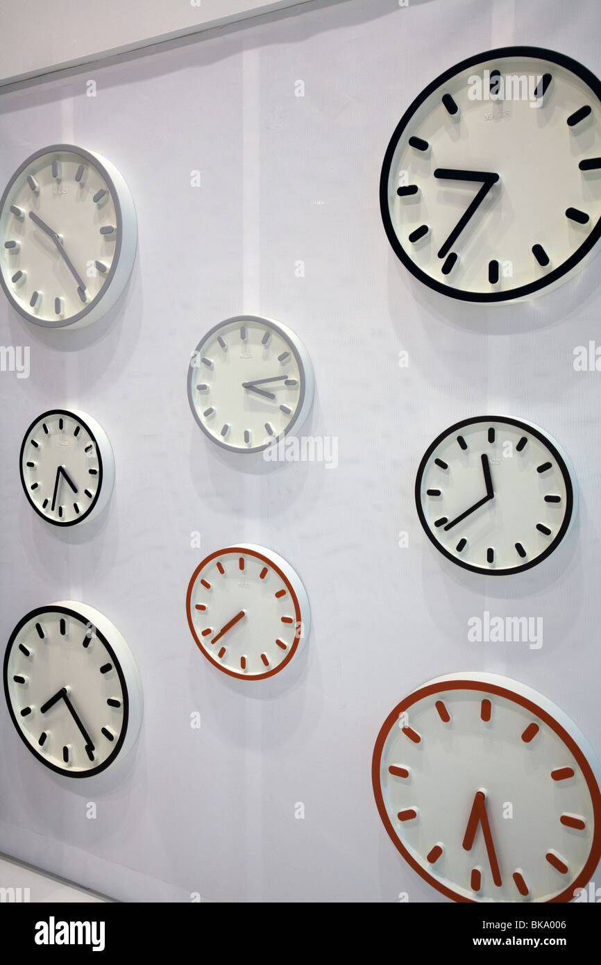 Contemporaneous wall clocks Stock Photo - Alamy