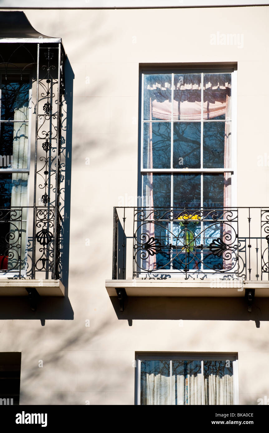Sash windows in a Regency stucco period style property with wrought ...