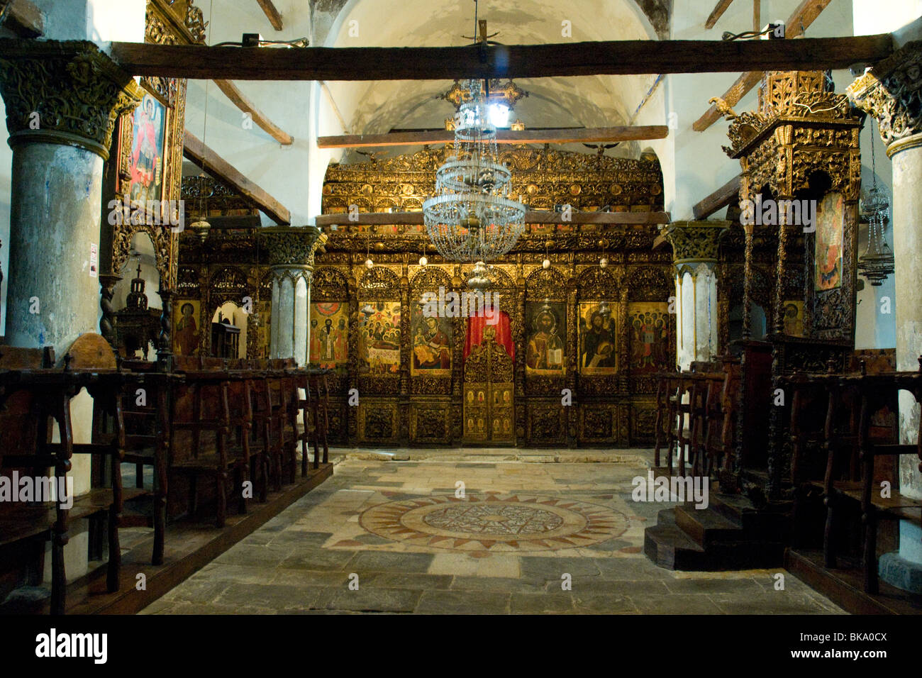 Facing the altar screen and splendid icons within the Onufri National ...