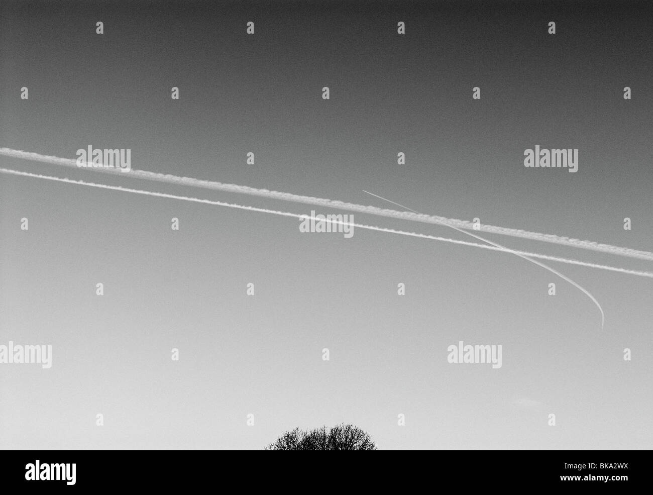 Condensed vapour trails hi-res stock photography and images - Alamy