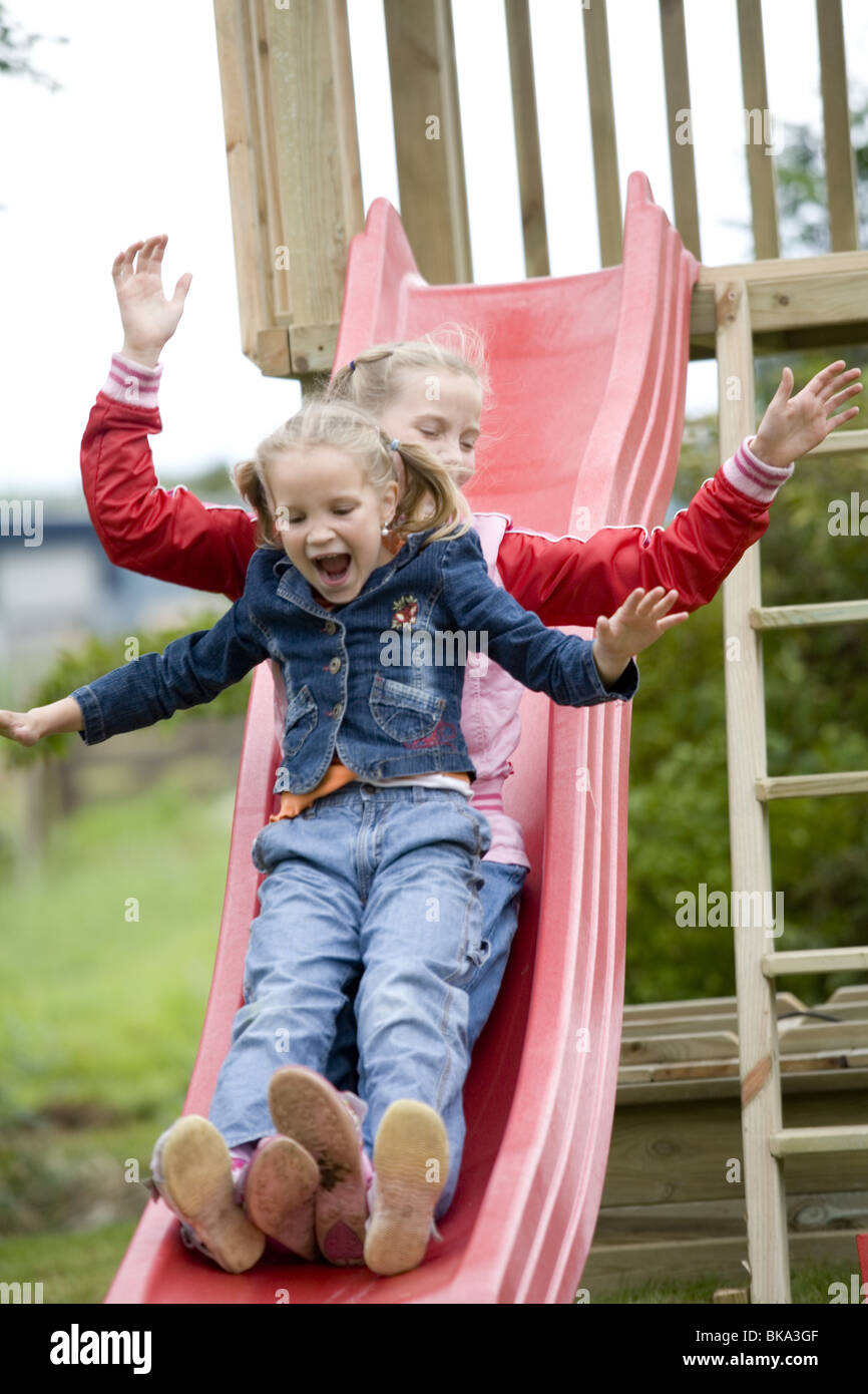 Girls kids sliding hi-res stock photography and images - Alamy