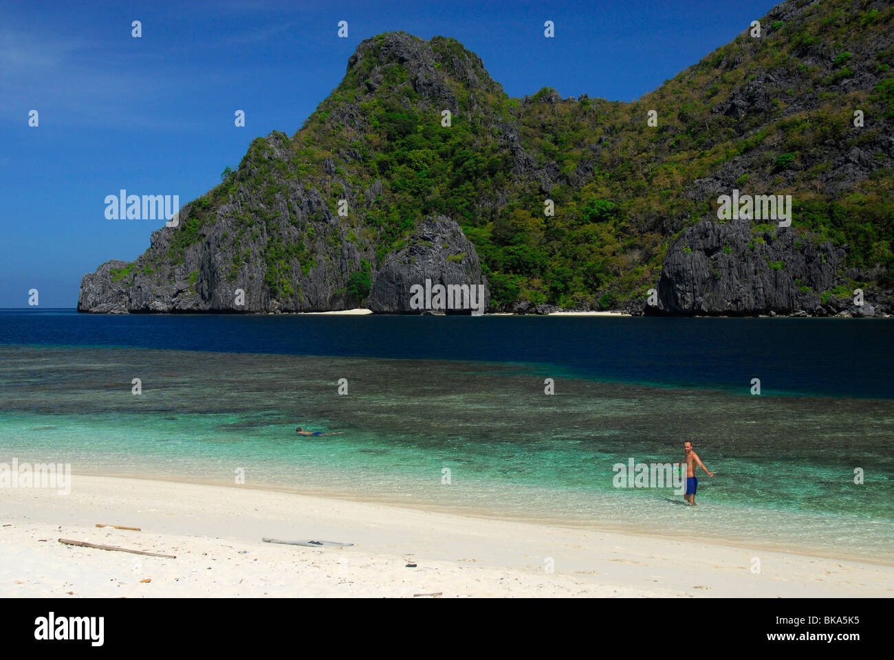 Tourist on the beach Stock Photo - Alamy