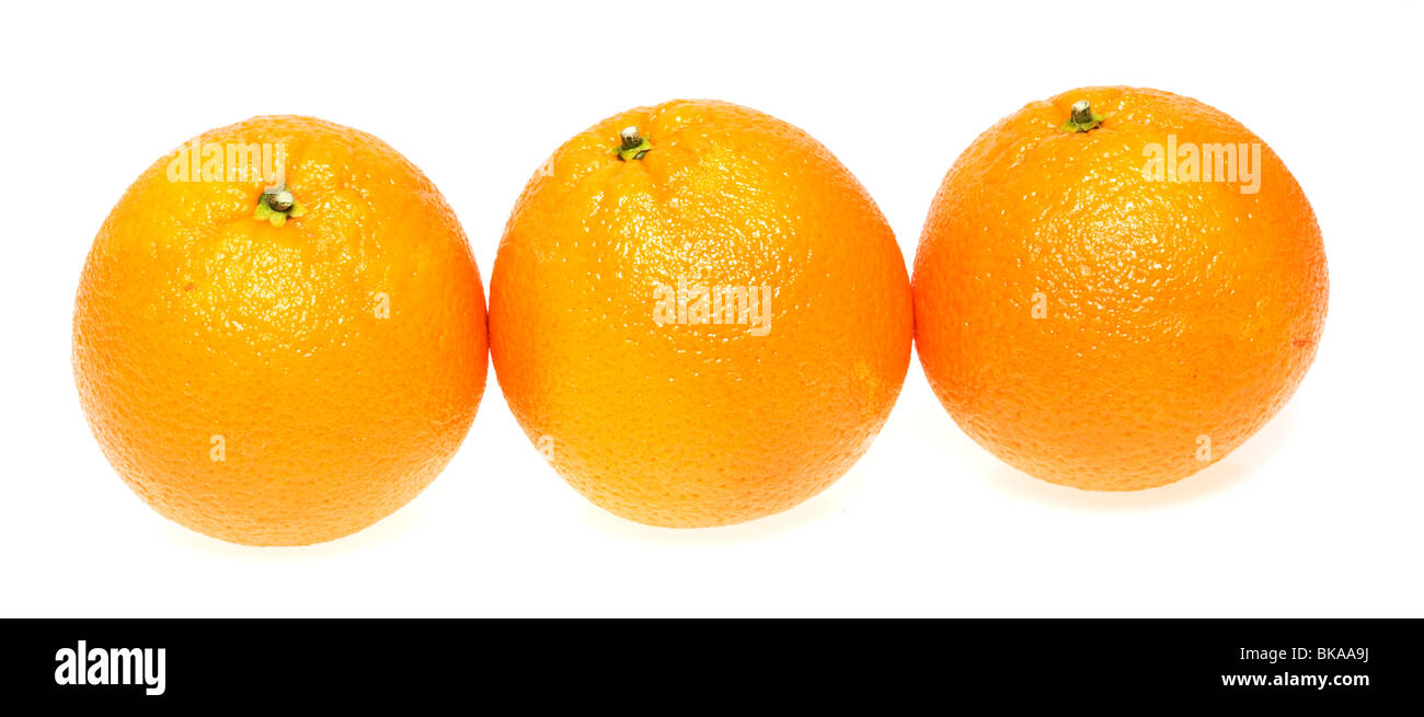 three oranges on white background Stock Photo - Alamy