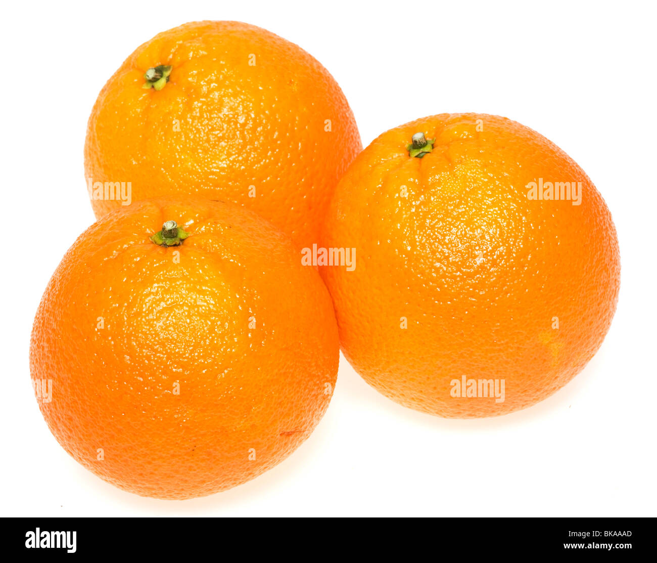 three oranges on white background Stock Photo - Alamy