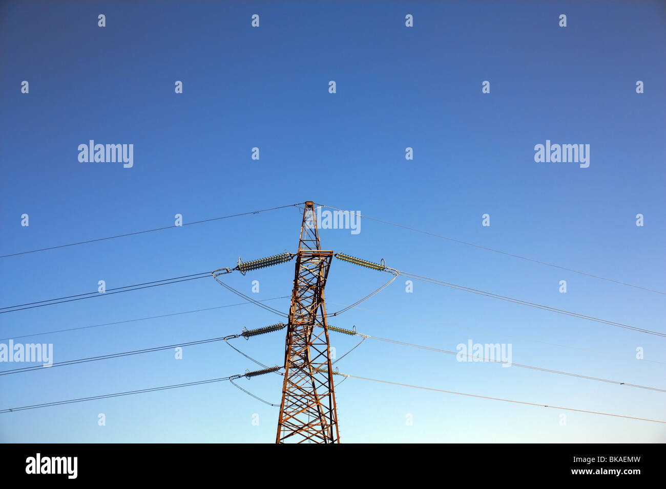 A high voltage pylon - center view with copy space Stock Photo - Alamy