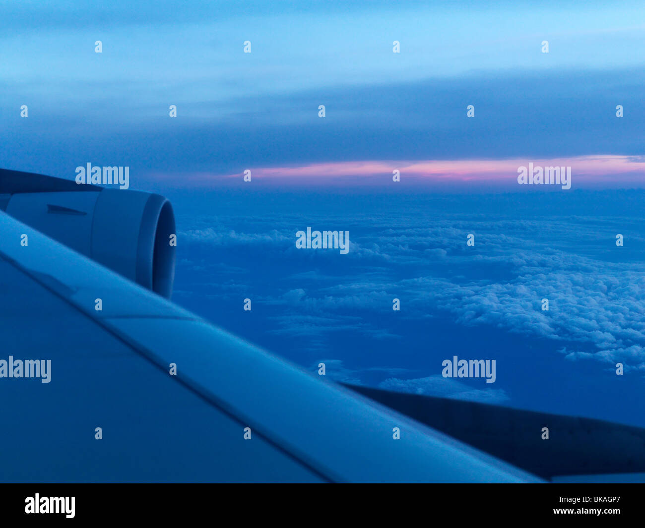 Sunset Through Aeroplane Window Stock Photo - Alamy