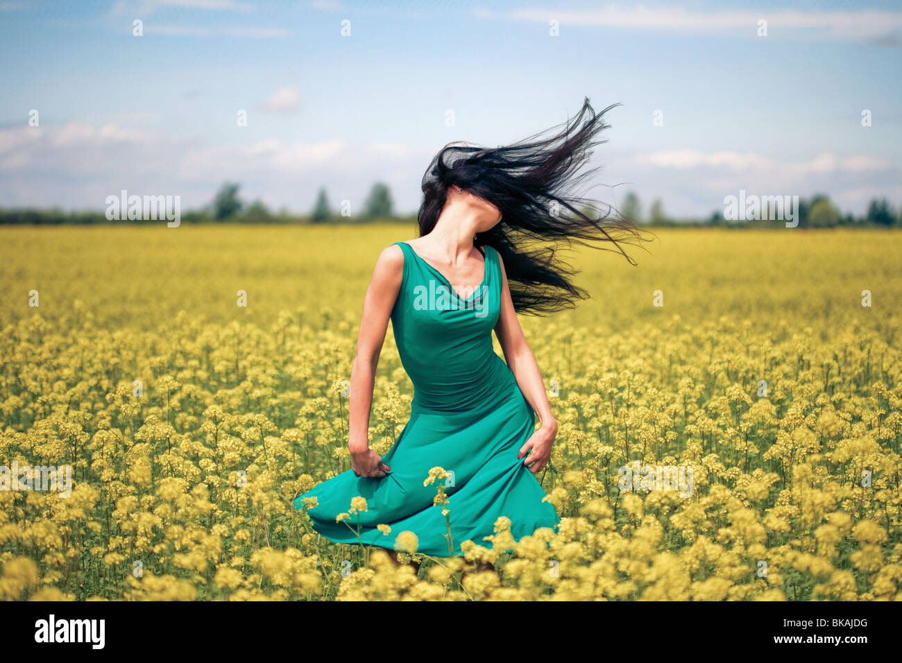 Beautiful woman in the field Stock Photo - Alamy