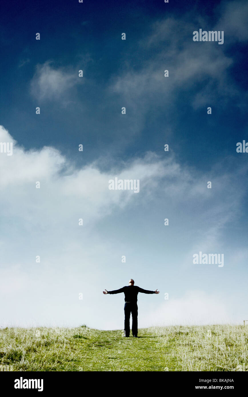 man embracing the sky Stock Photo - Alamy