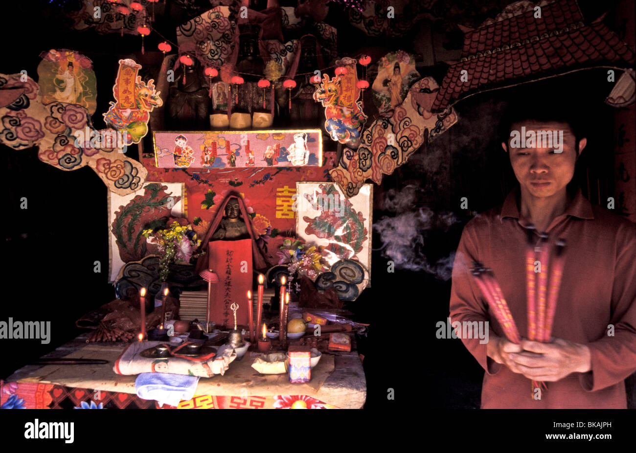 The altar with 8 Buddha’s during the Hakka Festival. The festival ...