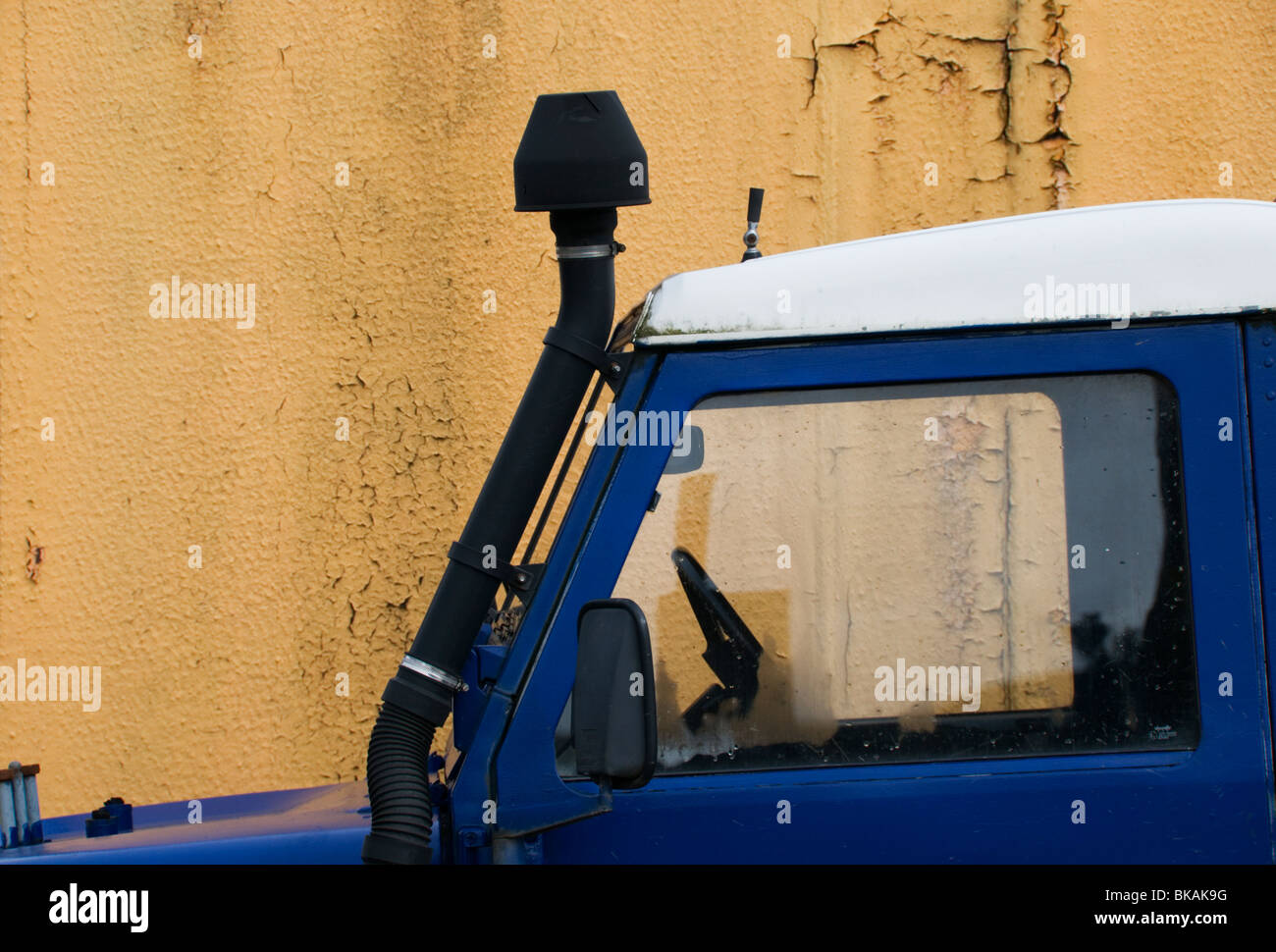 A Land Rover Defender with an air snorkel fitted Stock Photo - Alamy