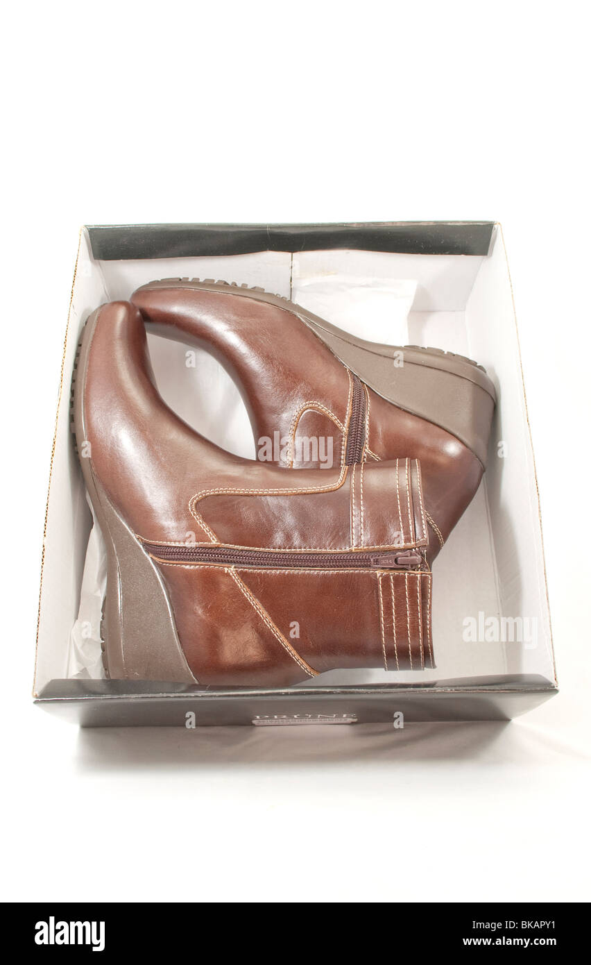 box with leather boots Stock Photo - Alamy