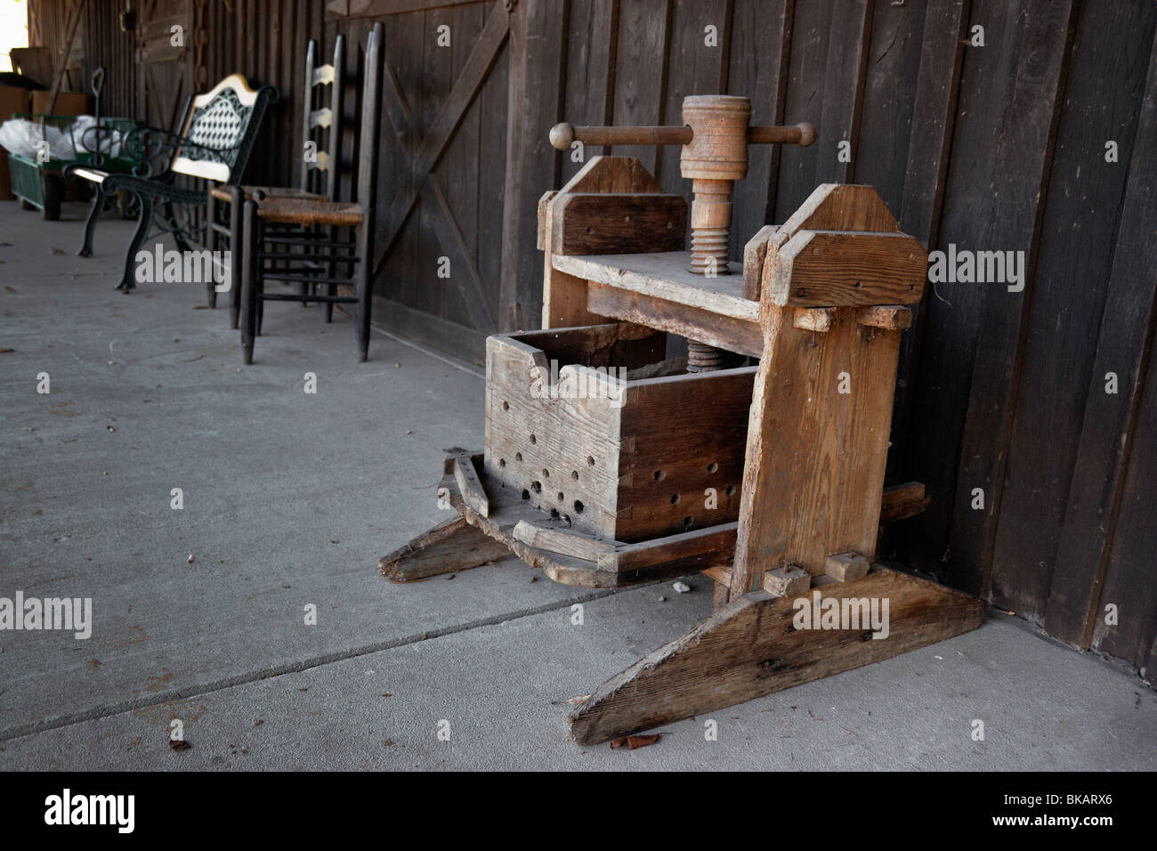 An antique grape press Stock Photo - Alamy