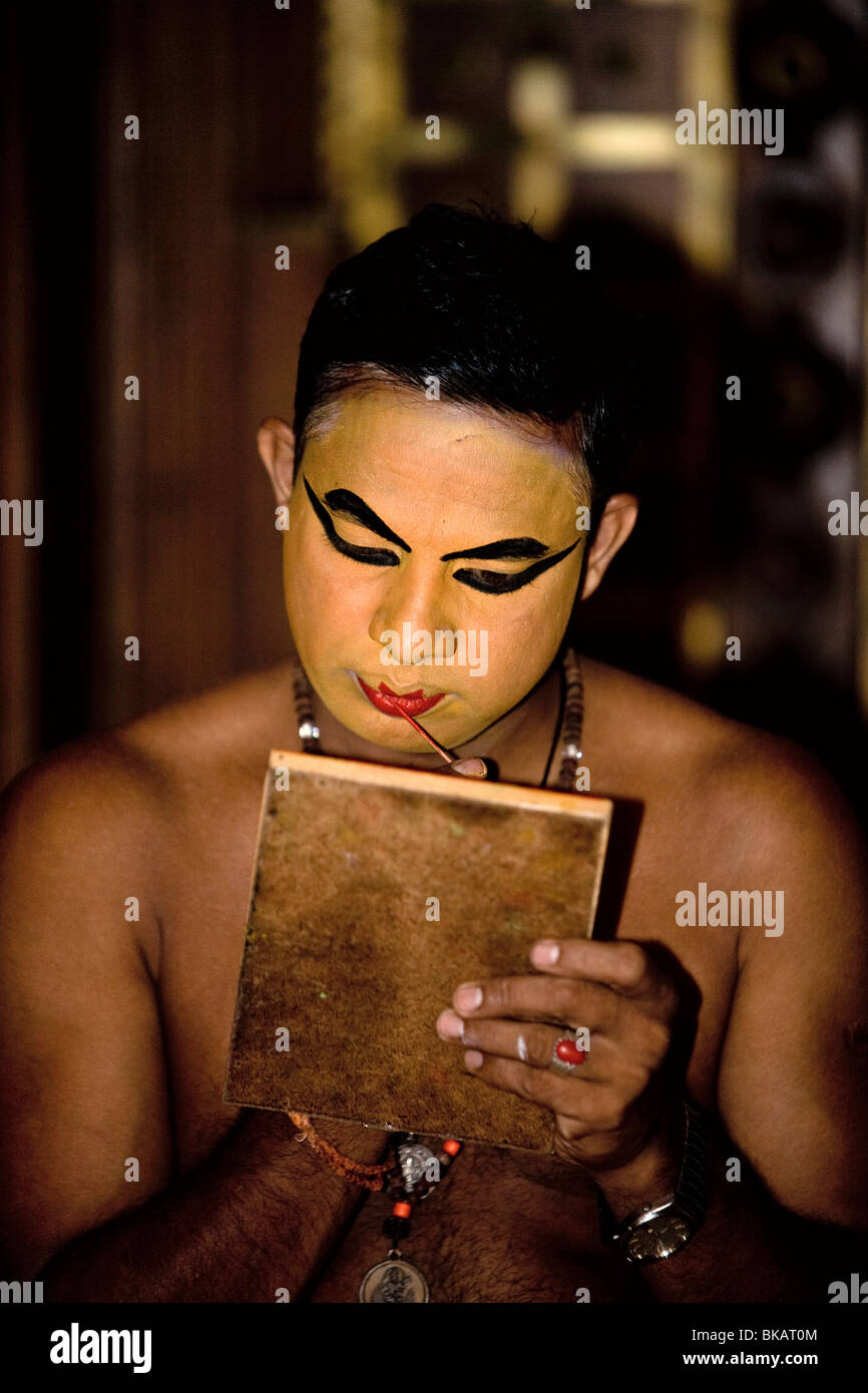 Kathakali Performers Applying Make Up Prior To Their Performance Stock kathakali-performers-applying-make-up-prior-to-their-performance-stock