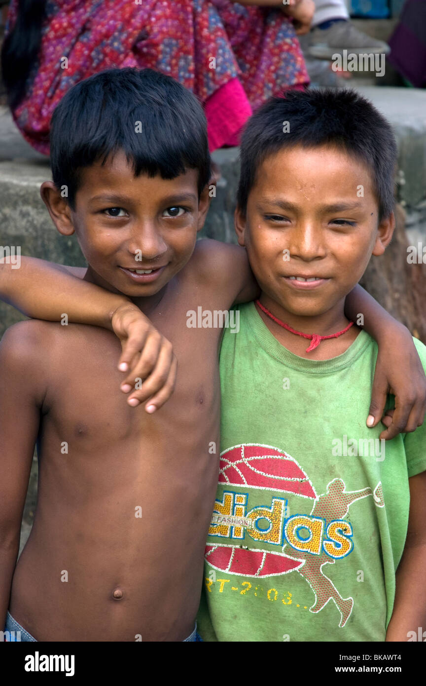 Two small Nepali boys smile for the camera in Nepal Stock Photo - Alamy