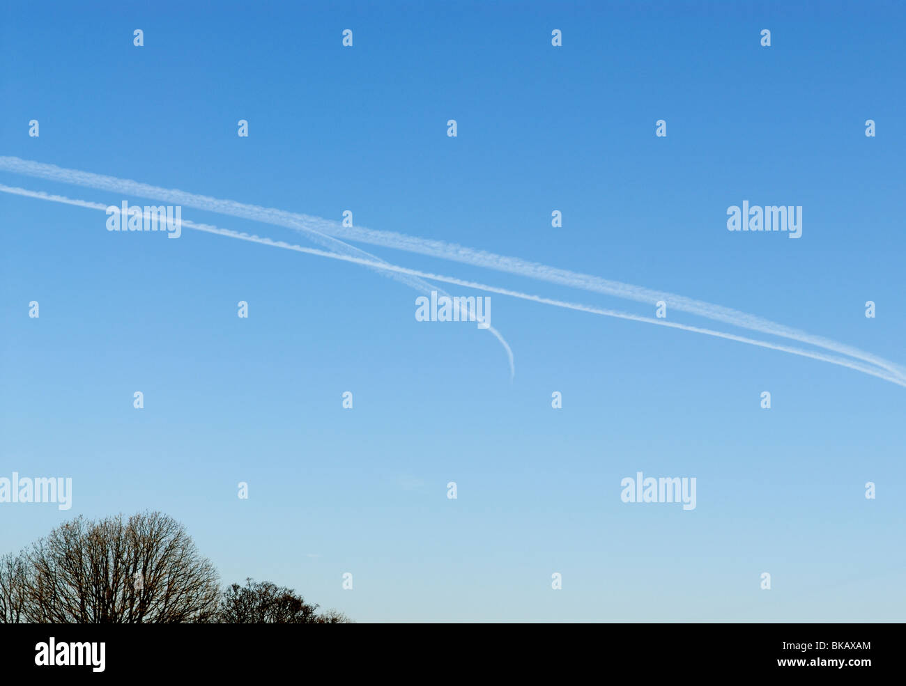 Condensed vapour trails hi-res stock photography and images - Alamy