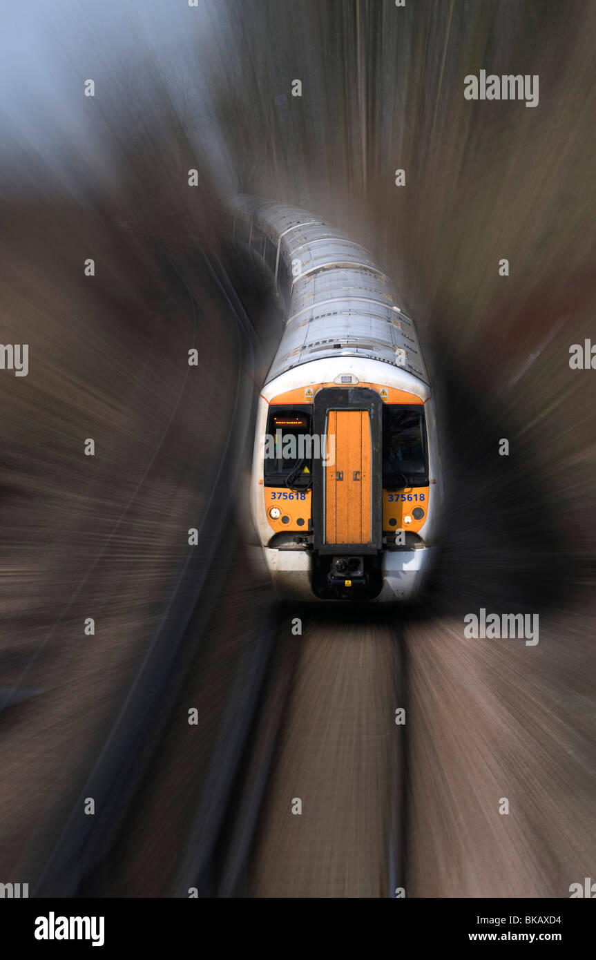 Highspeed train rush through the countryside Stock Photo - Alamy