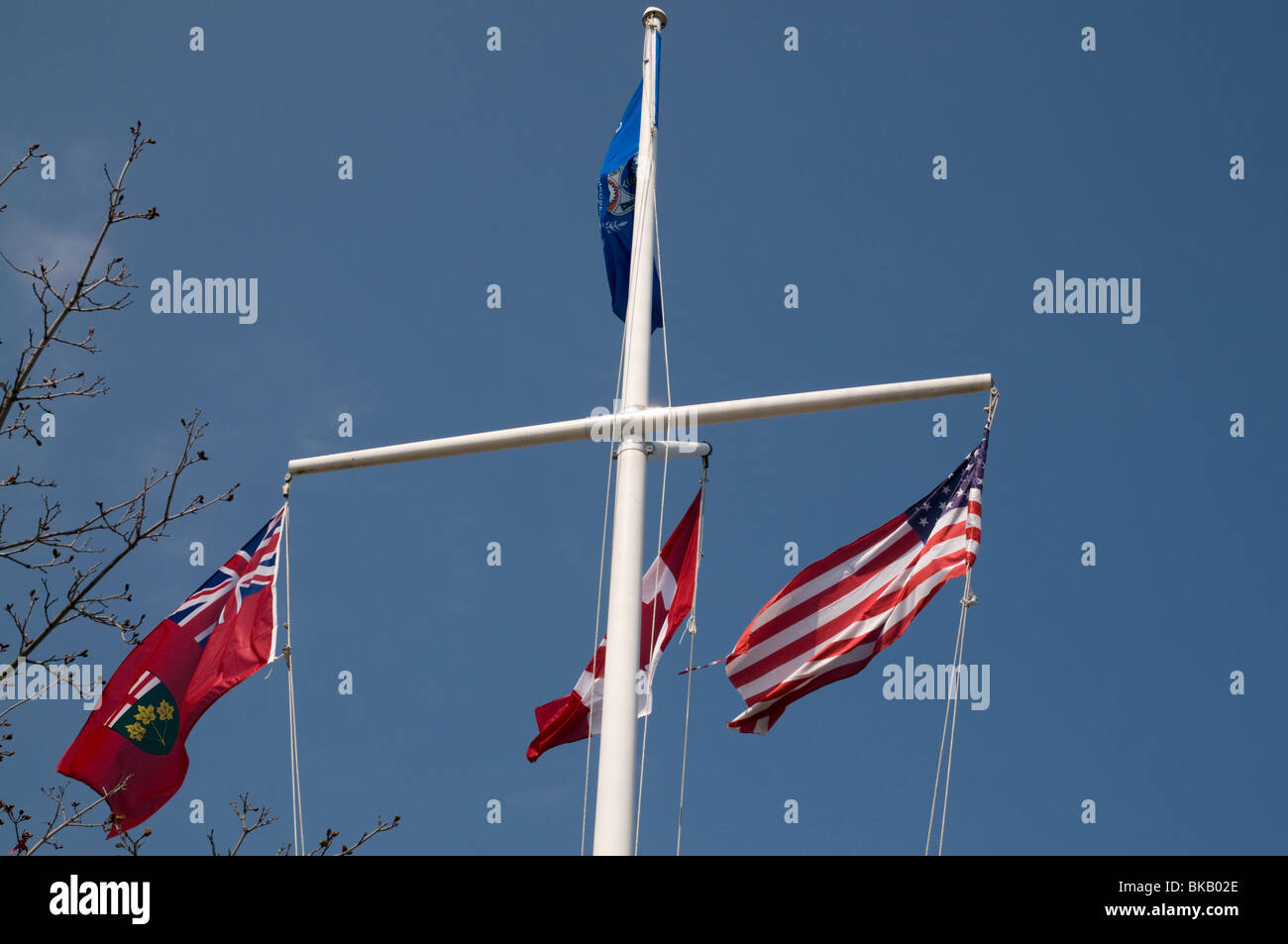 American flag blowing in breeze hi-res stock photography and images - Alamy