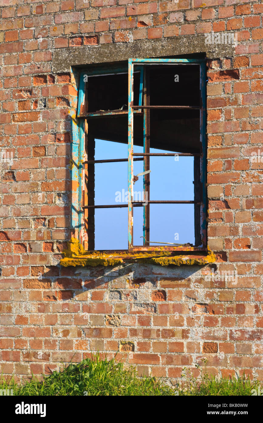 Metal window frame in disused farm building, Haddenham, Cambridgeshire ...