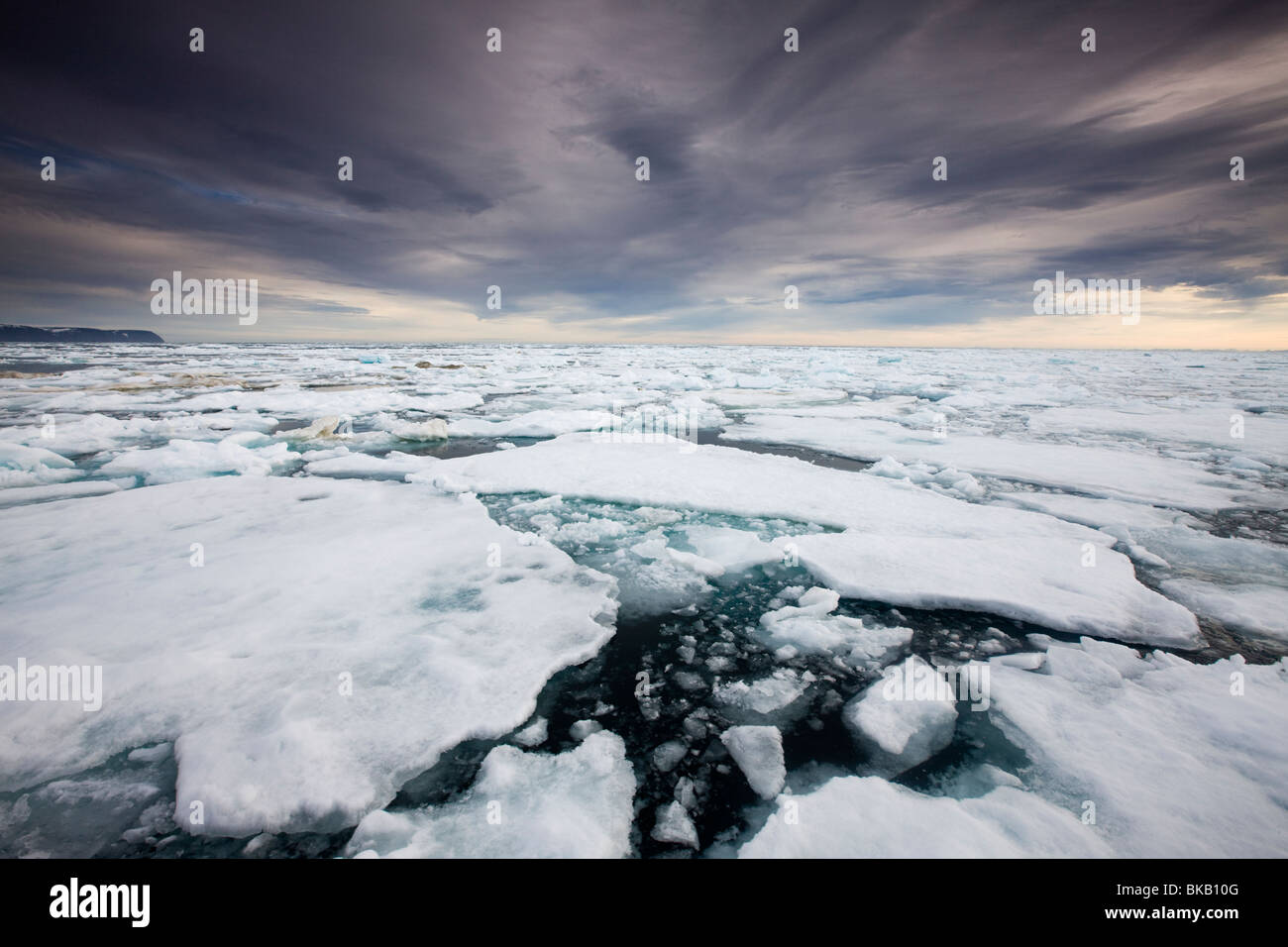 Norway, Svalbard, Edgeoya Island, Storm clouds above first year sea Ice ...