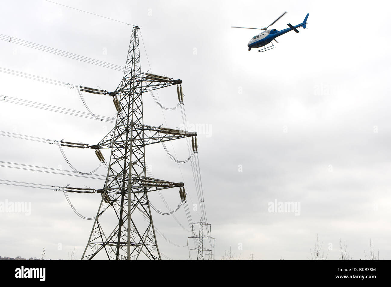 A National Grid helicopter checks out electricity pylons near Barnsley ...