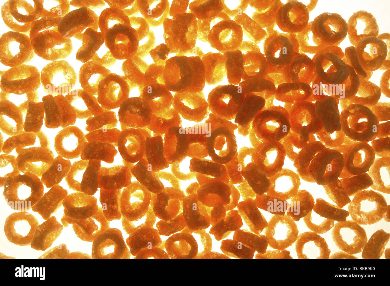 Round corn snack rings texture over transparent white Stock Photo - Alamy