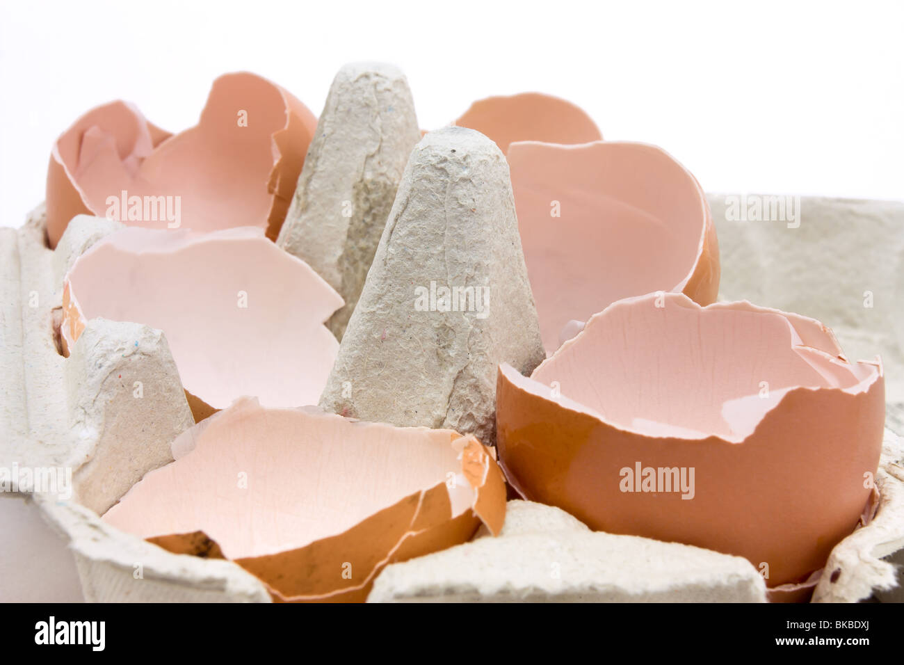 A collection of broken egg shells in cardboard egg box concept Stock ...