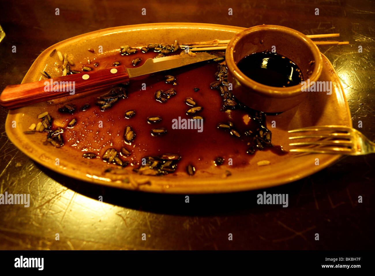 End of lunch, diner, dirty table, golden light Stock Photo - Alamy