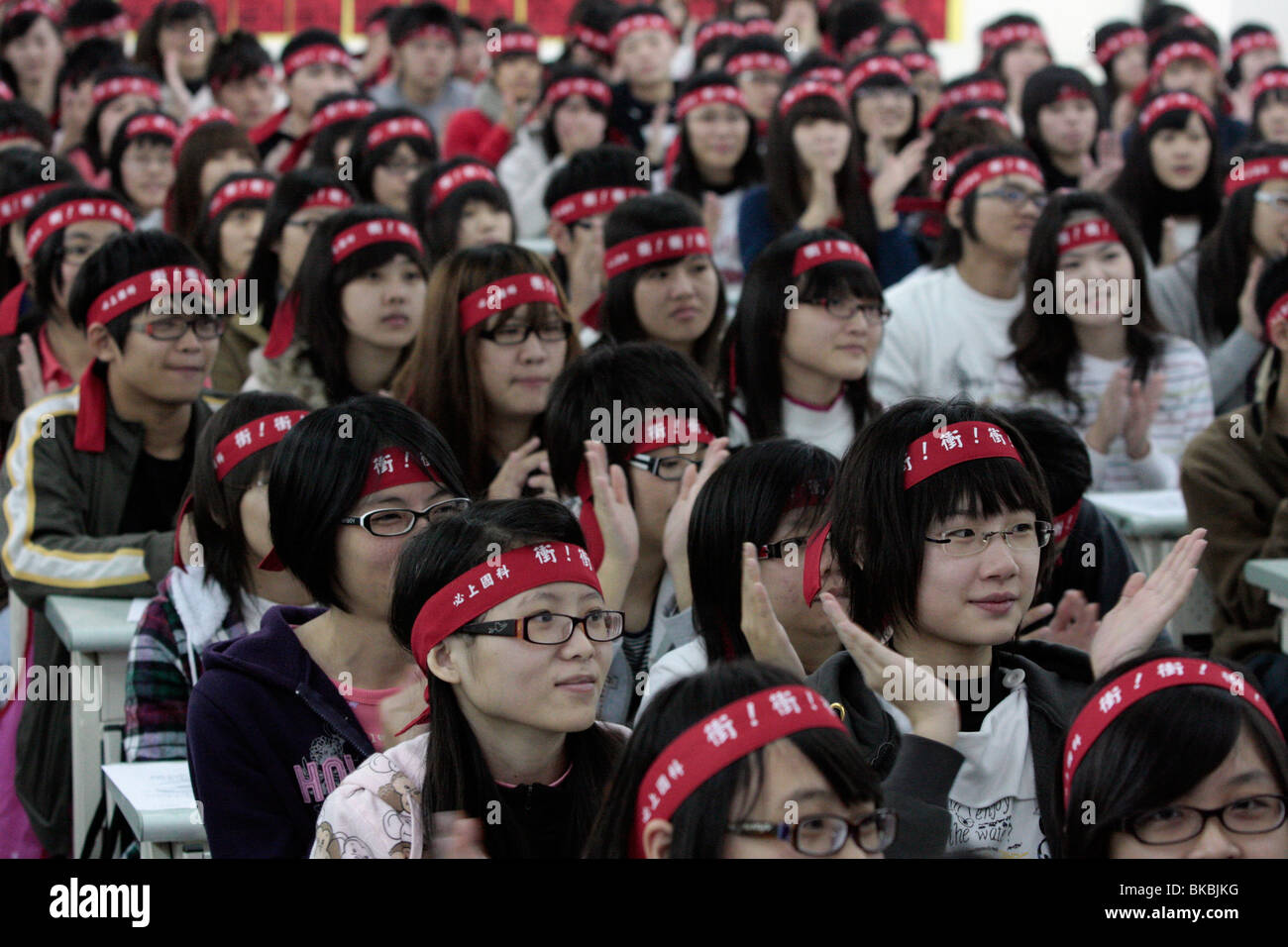 Youth sit in classroom for studying hard in order pass college ...
