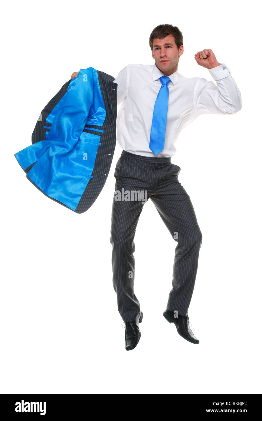 Photo of a businessman jumping in the air holding his suit jacket ...