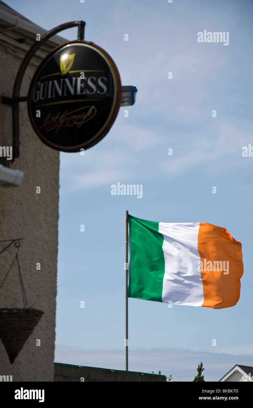 Irish tricolour flag flies outside a Donegal bar Stock Photo - Alamy