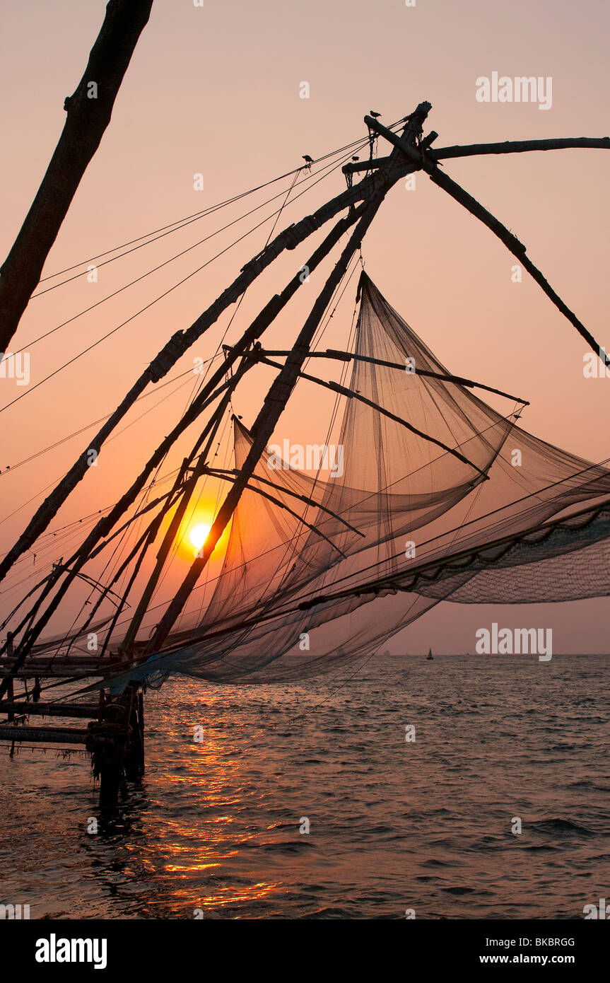 Chinese Fishing nets at sunset, Fort Cochin, Kerala, India Stock Photo ...