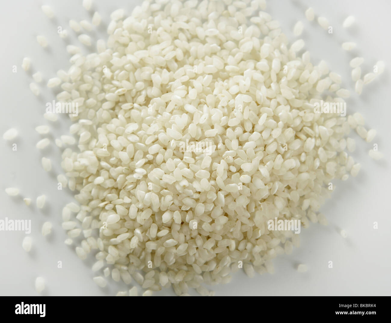 White rice close up texture. Background pattern of rice seeds from ...