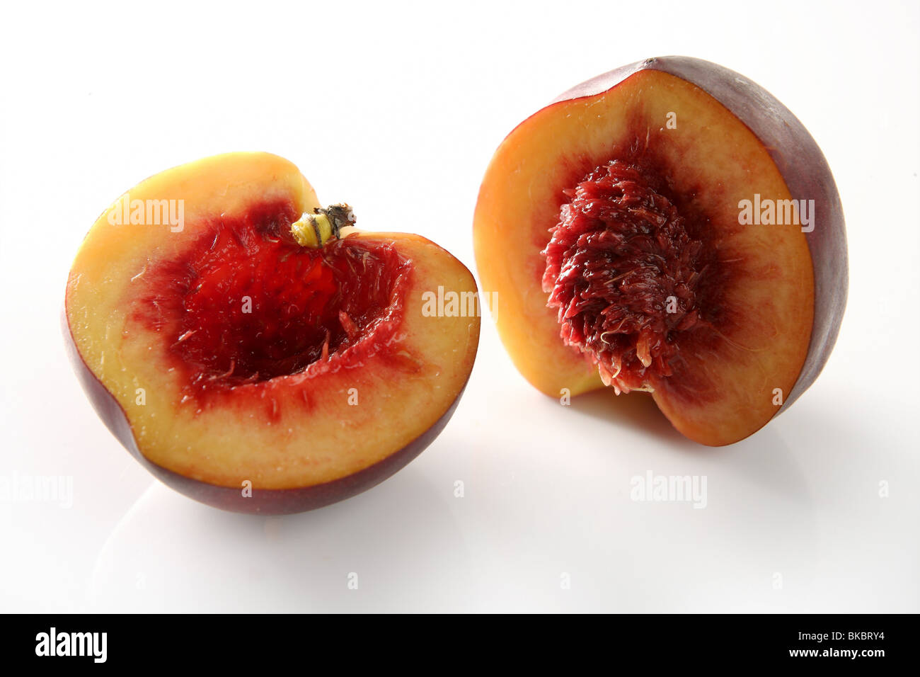 Metaphor of bloody inside of half peach Stock Photo - Alamy