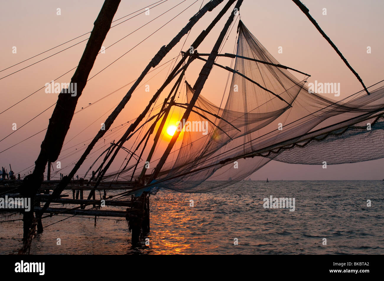Chinese Fishing nets at sunset, Fort Cochin, Kerala, India Stock Photo ...
