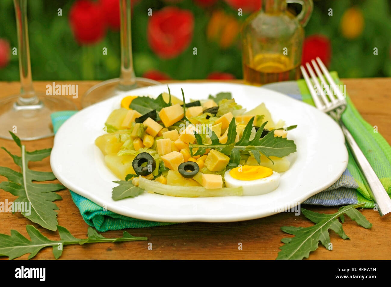 Potato salad with rocket and cheese. Recipe available Stock Photo - Alamy