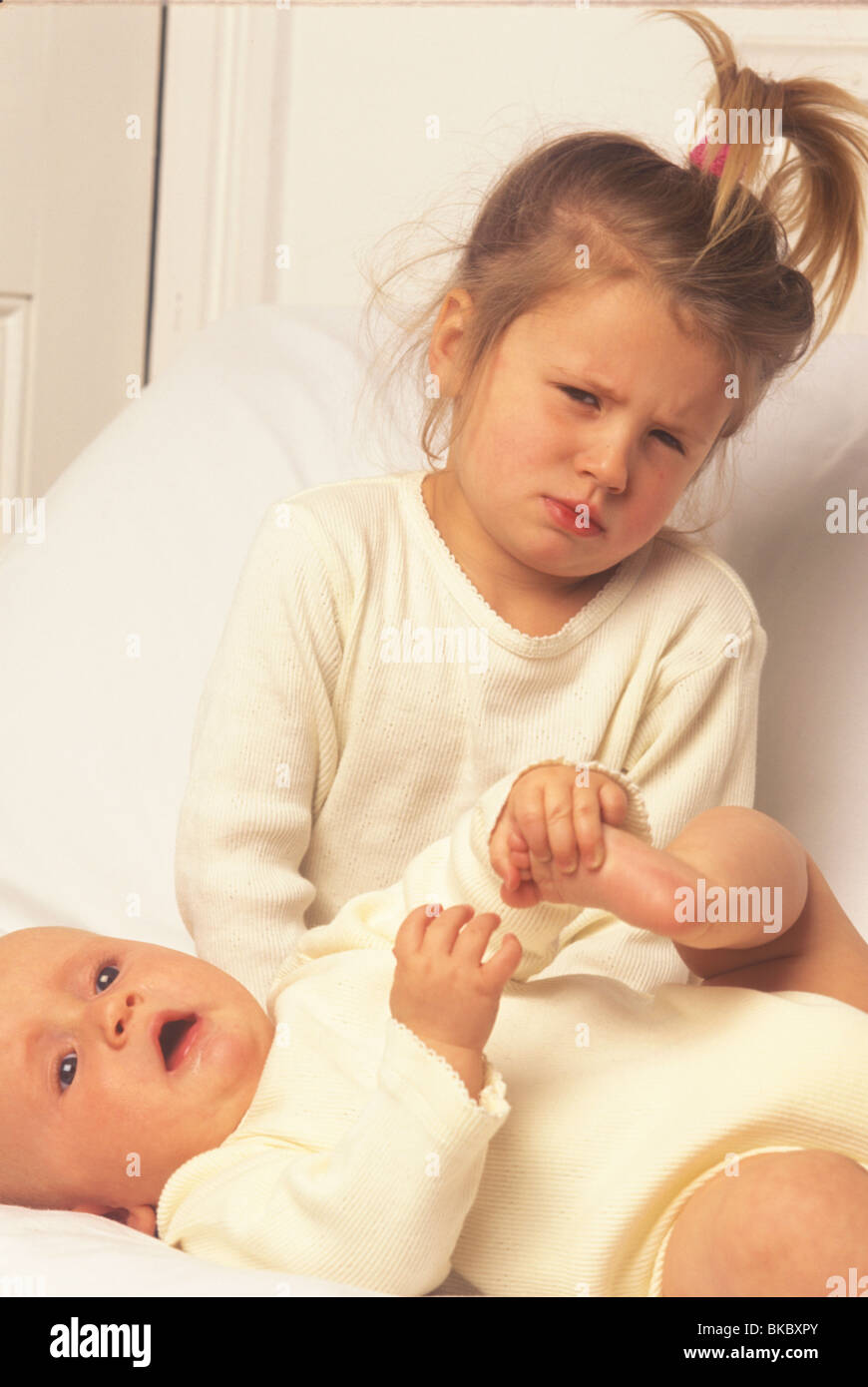 Toddler jealous of baby hi-res stock photography and images - Alamy